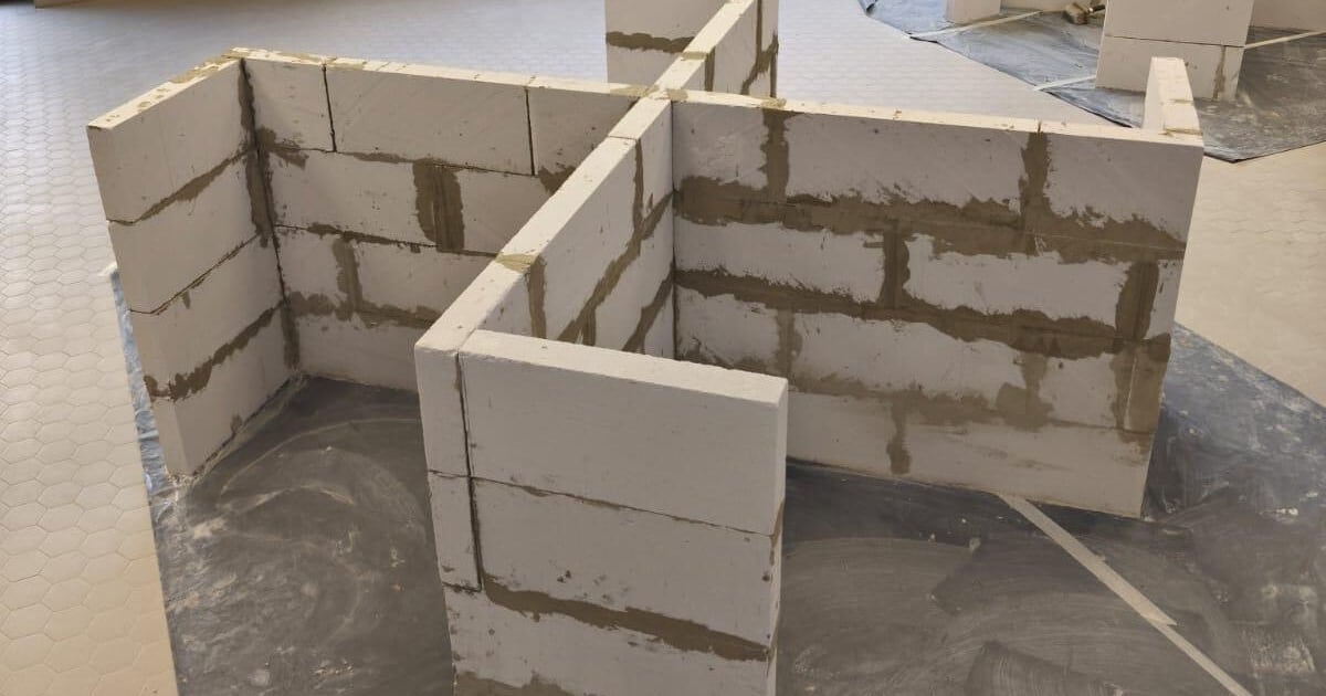 Charges against teacher - Outrage over swastika bricked up in class ...